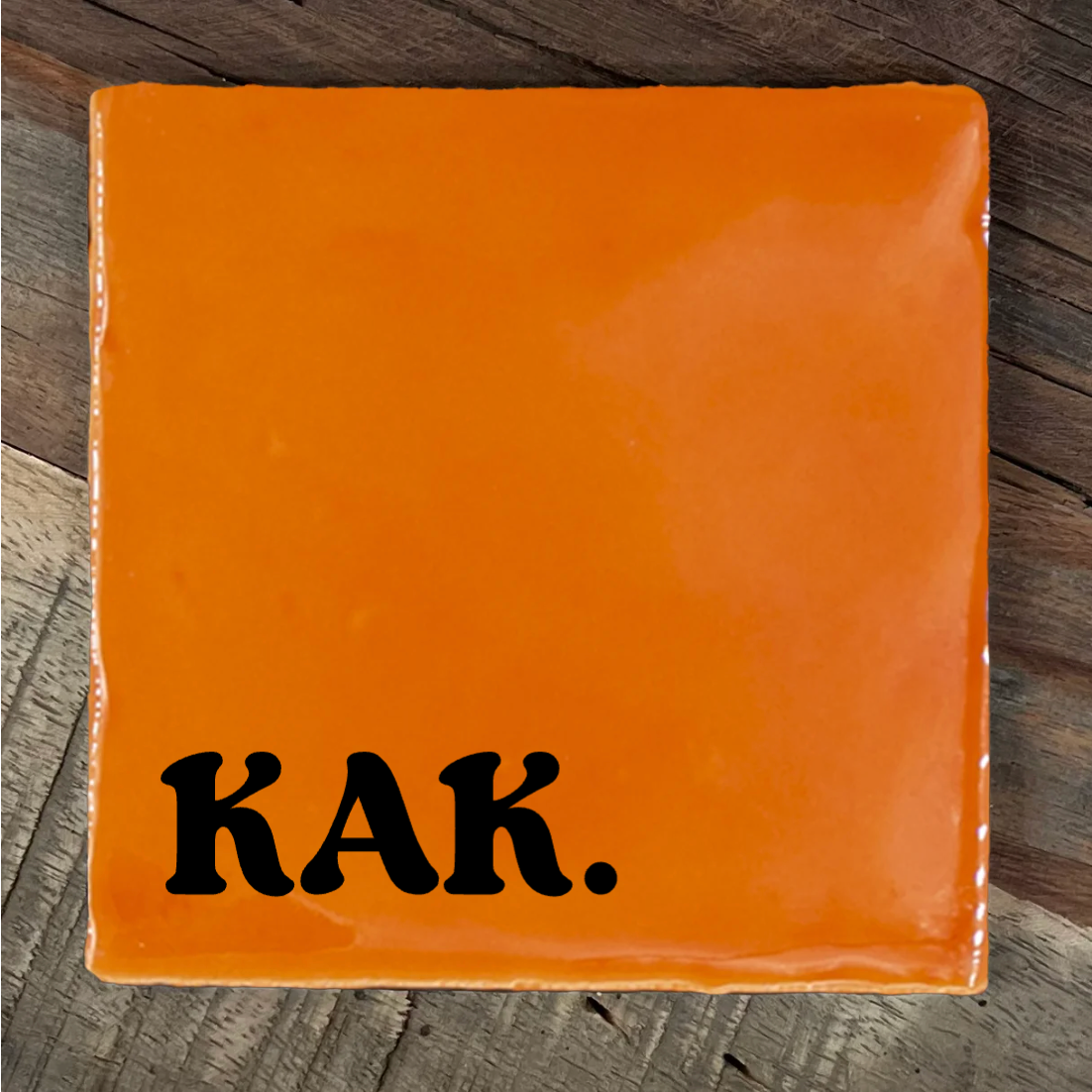 Tegeltje kak – Label2X B.V.